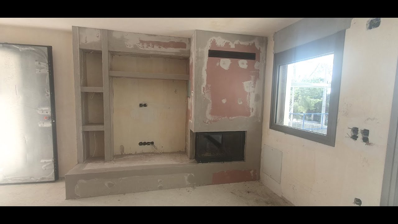 Τοποθέτηση υδραυλικού ενεργειακού τζακιού που συνδέεται με τα σώματα ...