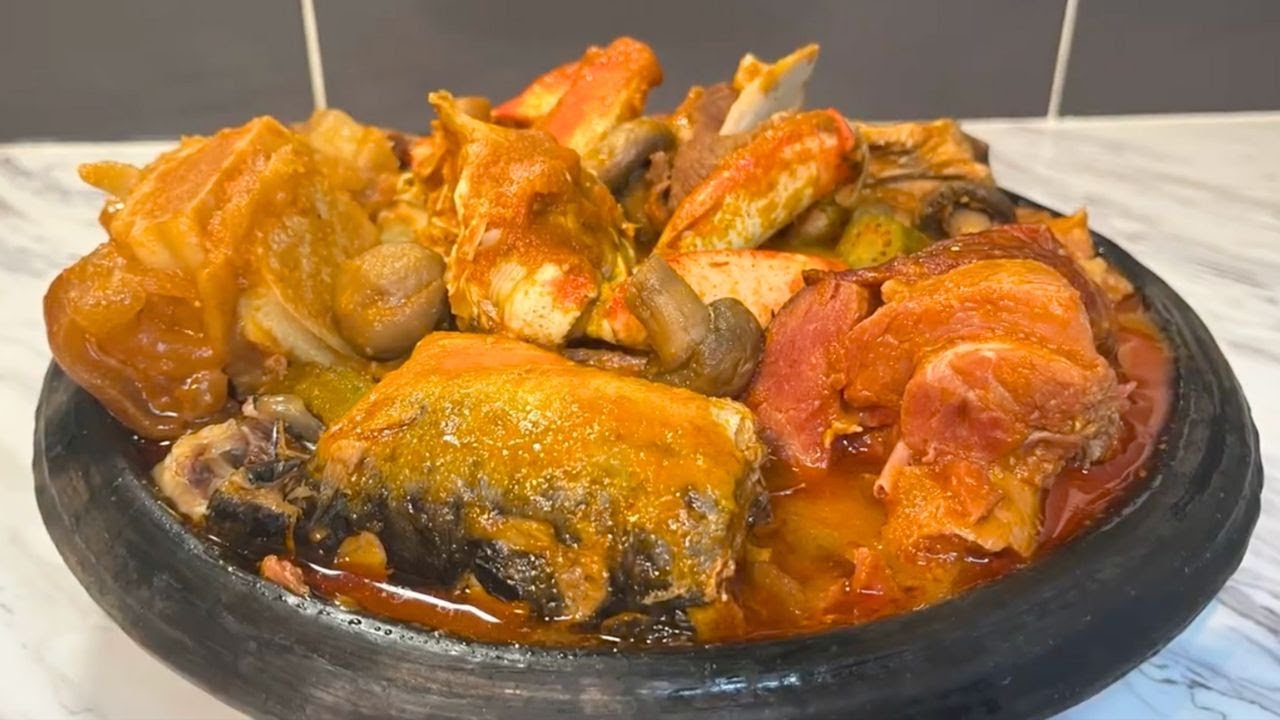 GOAT MEAT MACKEREL CRAB LIGHTSOUP WITH FUFU - YouTube