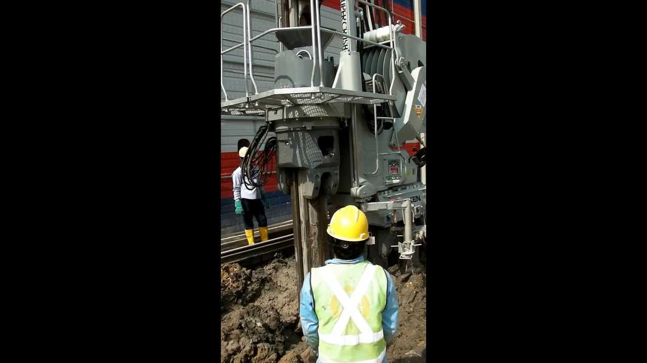 Crush Piler installing Sheet Pile - Close up View (Fuchi Pte Ltd) - YouTube