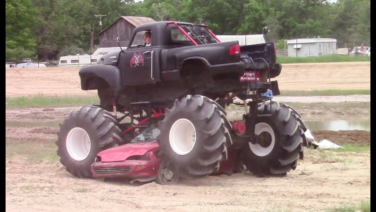 High Anxiety Truck Gets Stuck On A Car At Orleans Michigan Mudfest ...