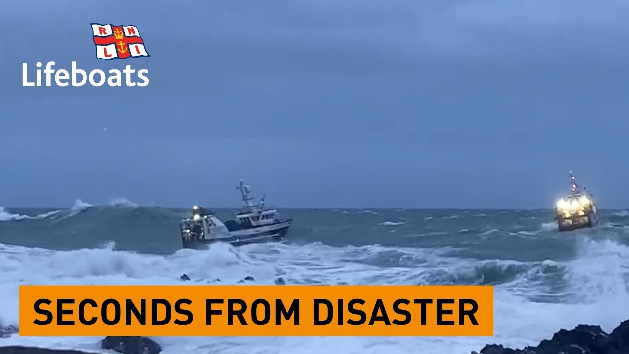 Lifeboat saves fishing vessel from being smashed on rocks - YouTube