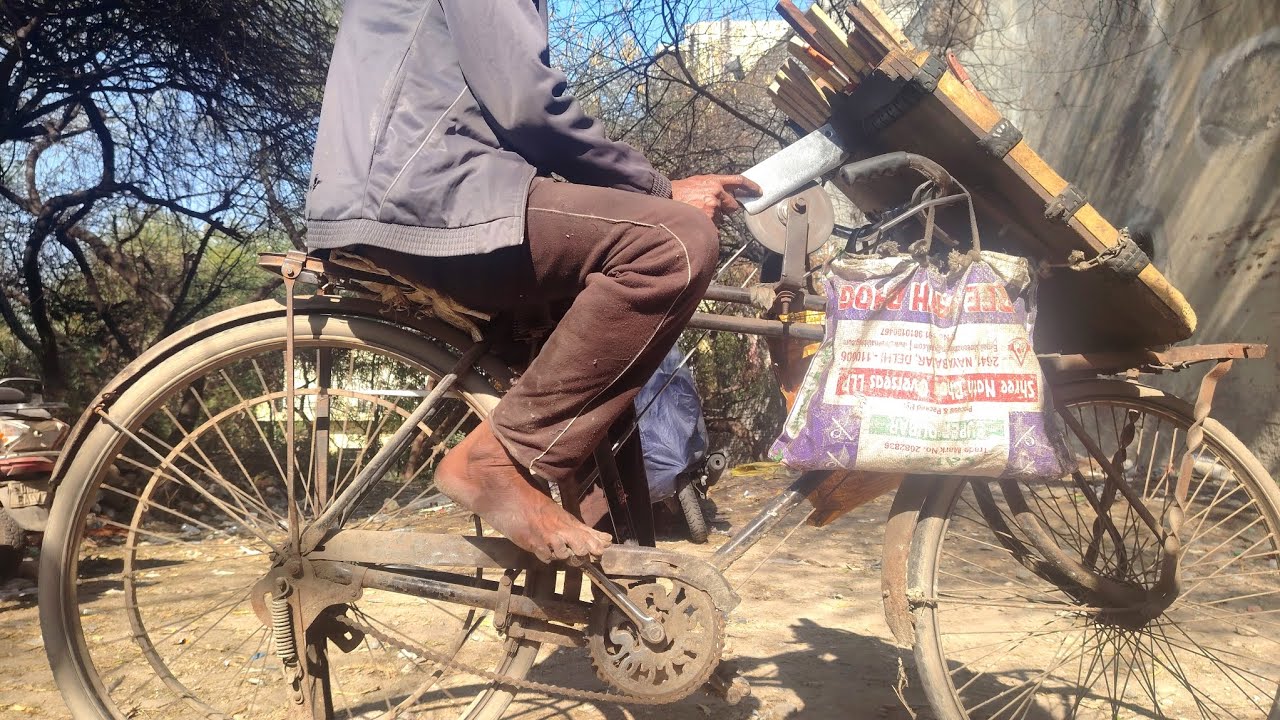 Old uncle use his cycle as a knife sharpener #smart work - YouTube