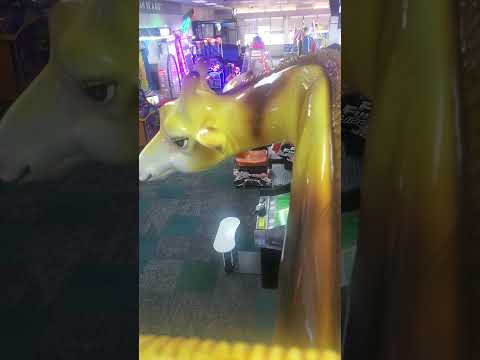 chuck e cheese giraffe kiddie ride - YouTube