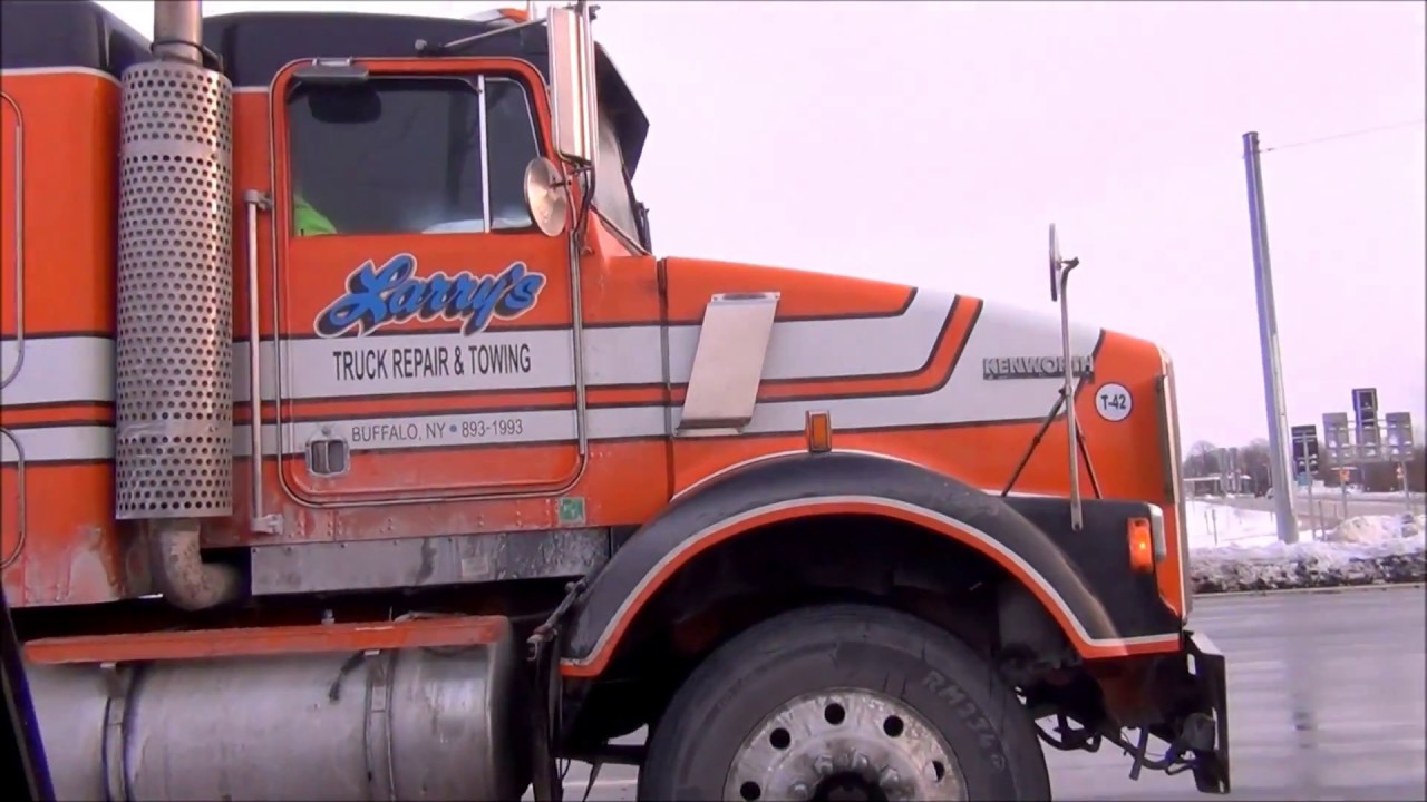 Big Wrecker Towing Semi Truck - YouTube