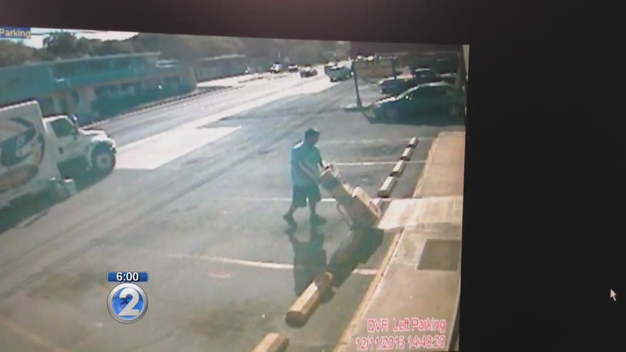 Hero stops rolling car with kids inside - YouTube
