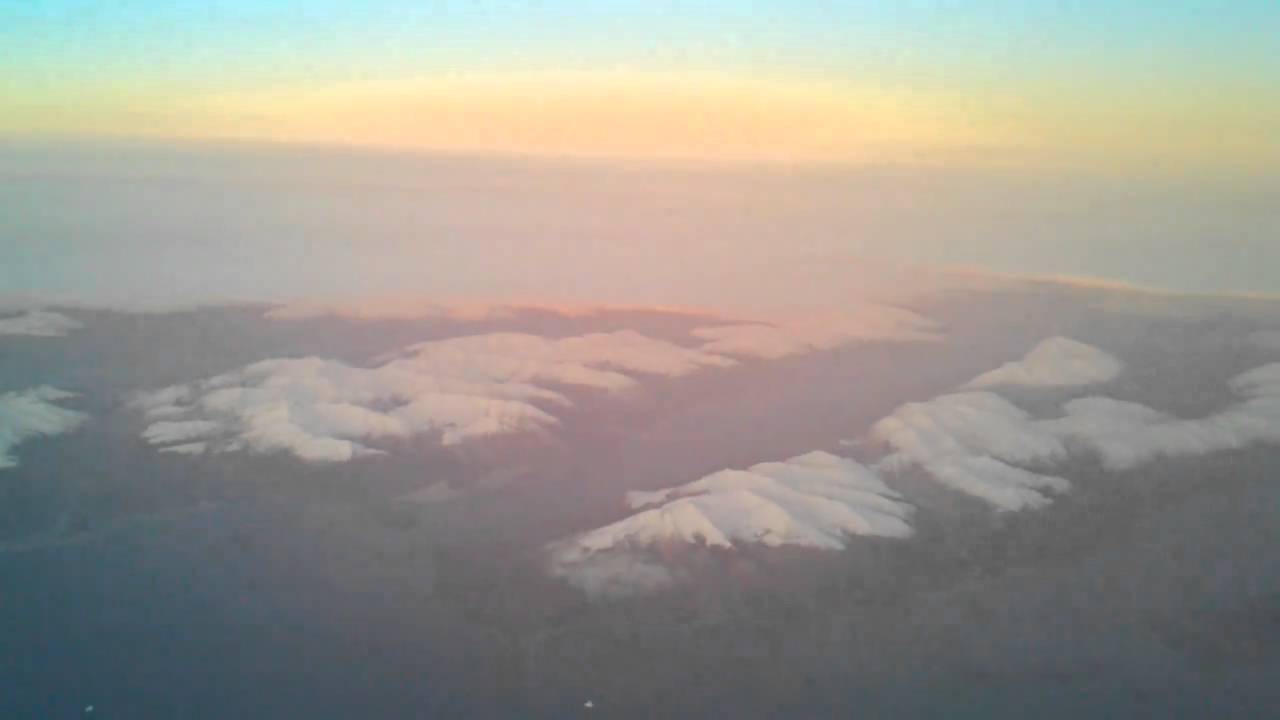 Icebergs visible while flying over Northern Greenland - YouTube