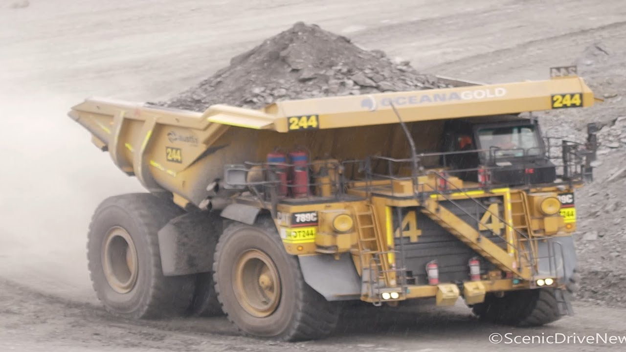 Caterpillar CAT 789C Dump Trucks Working in Macraes - YouTube