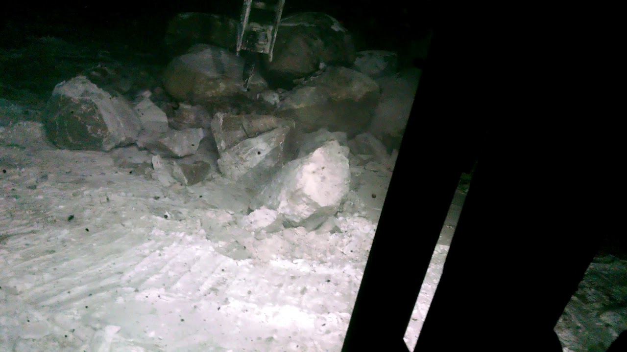 Hammering boulders - YouTube