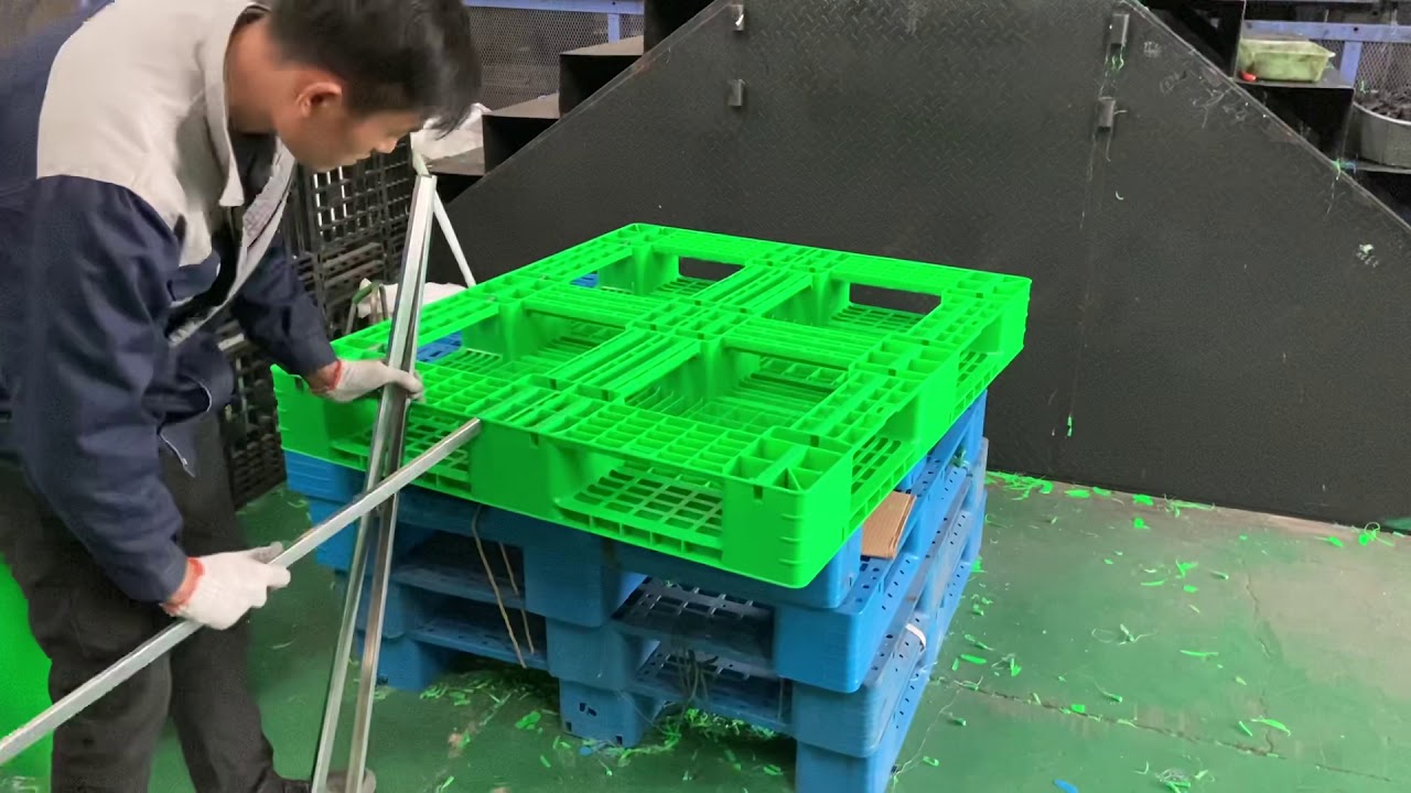 How steel tubes inside into plastic pallet - YouTube