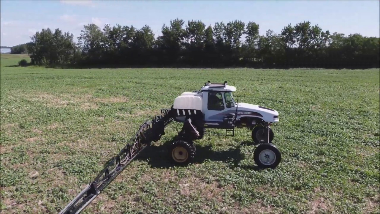 Spraying Canola 07-20 - YouTube