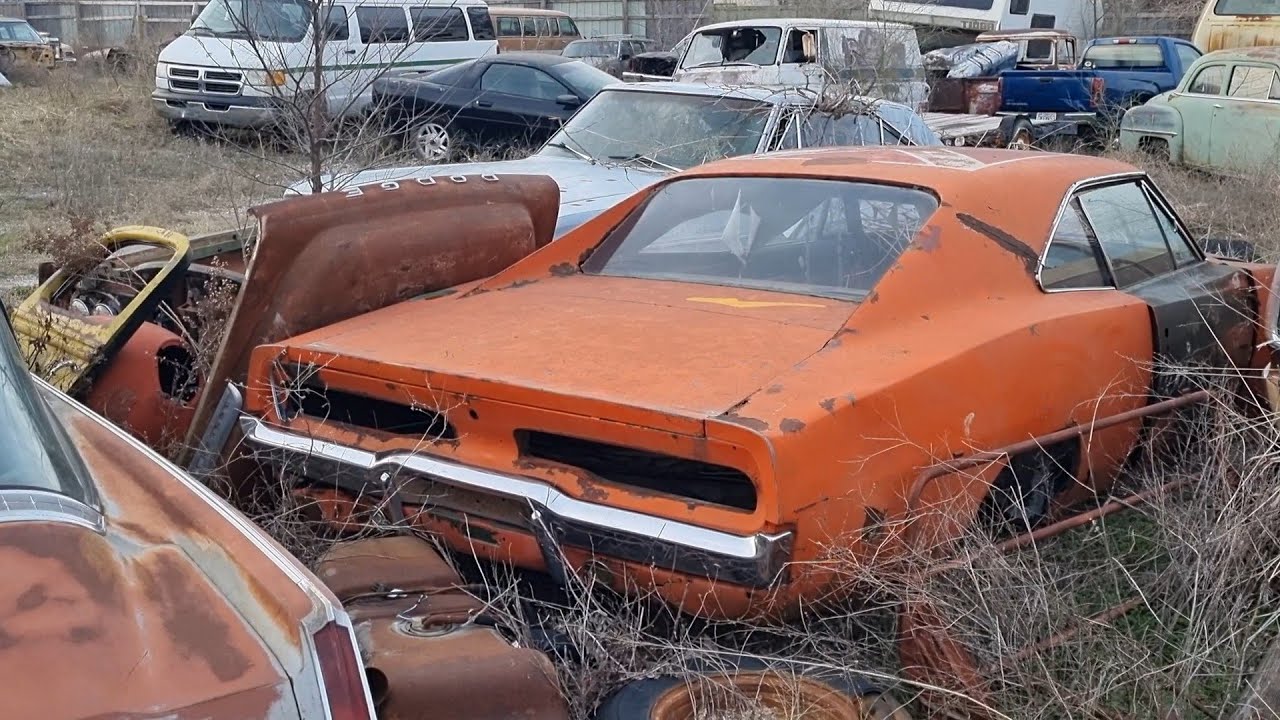 The secret mopar graveyard! barn find Dodge Chargers, and much much ...