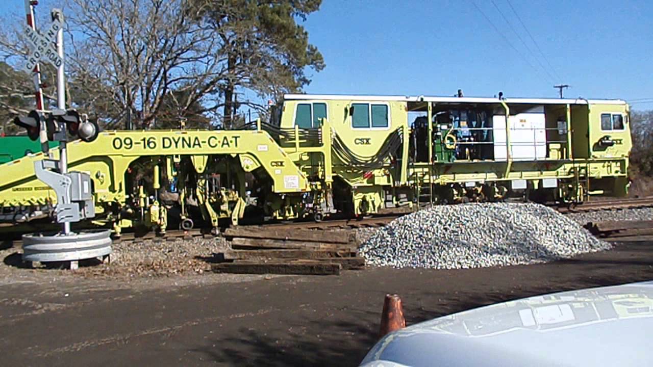 CSX Leland, NC. Cat Tamper at work. Mt. Misery road - YouTube
