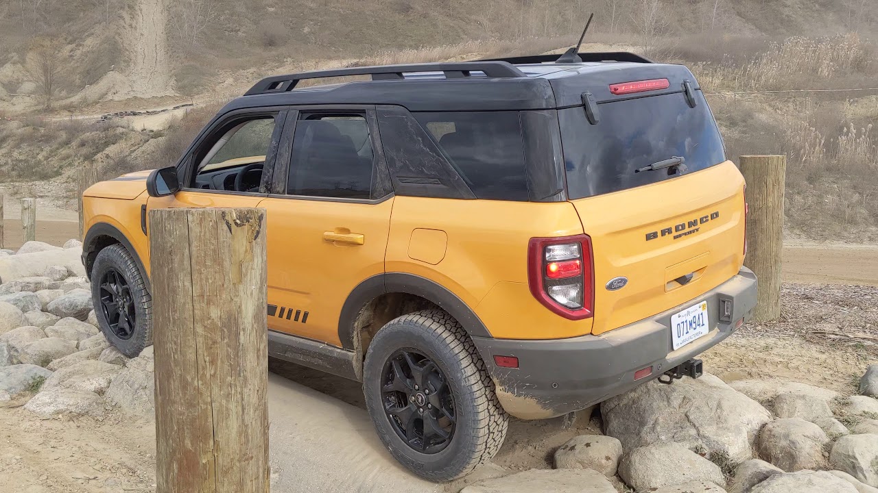 2021 Ford Bronco Sport crawling over rocks and logs - YouTube
