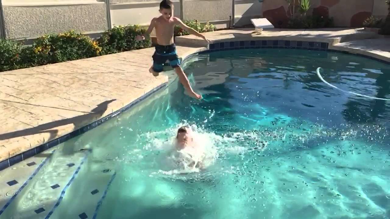 Jumping into the Pool in October - Slow Motion - YouTube