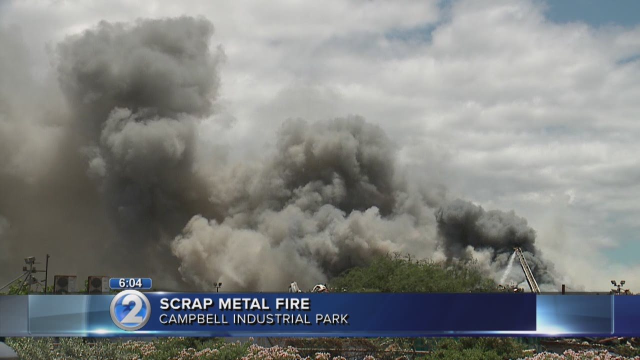 Firefighters battle scrap metal fire at recycling center - YouTube