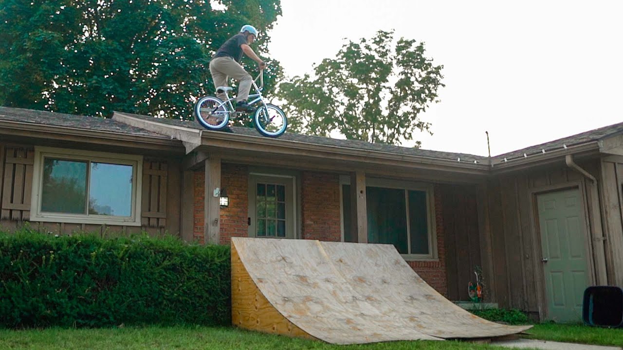 Riding BMX Bike off of House Roof - YouTube