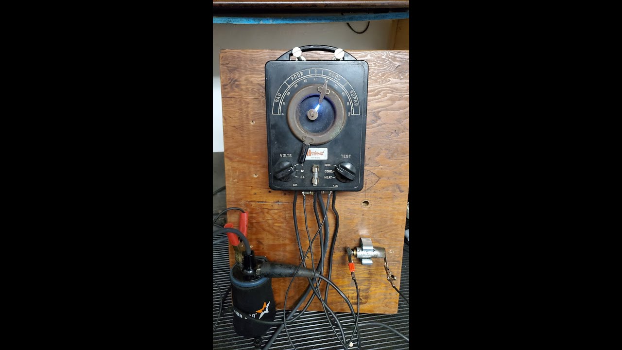 A demostration showing the effect of a bad condenser on an ignition ...