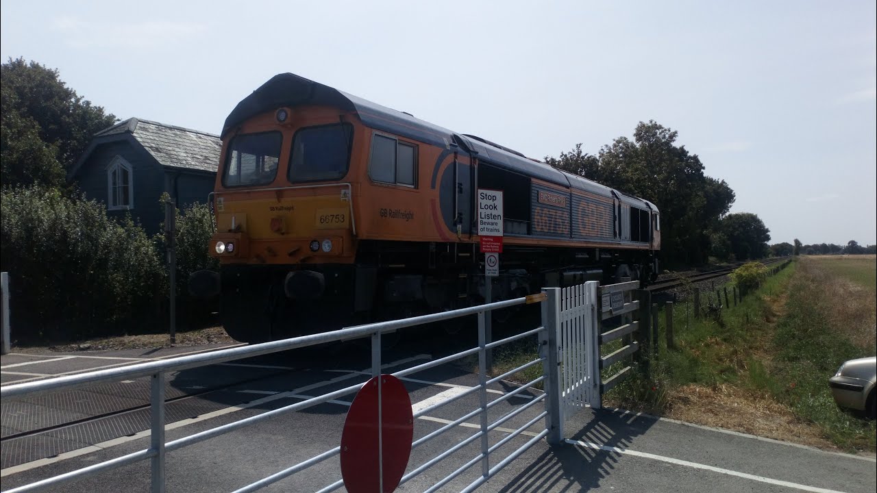 GBRF 66753 'EMD Roberts Road' runs light engine past Tunstead Church ...