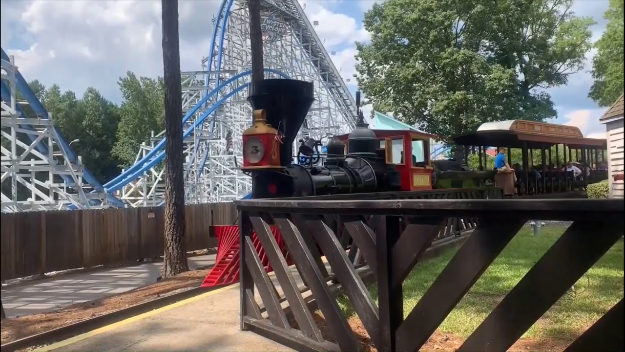 Six Flags Over Georgia train arriving at the station. - YouTube
