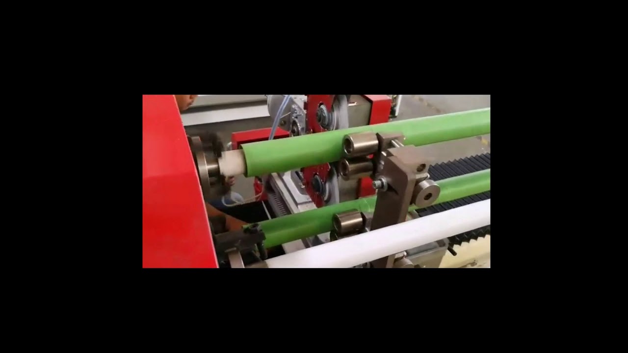 4 shaft adhesive tape cutting machine - YouTube