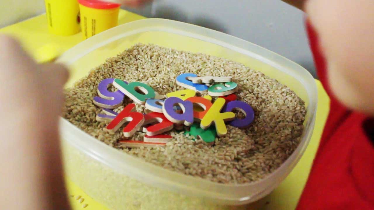 learning ABC Phonics and finding letters on the rice container - YouTube