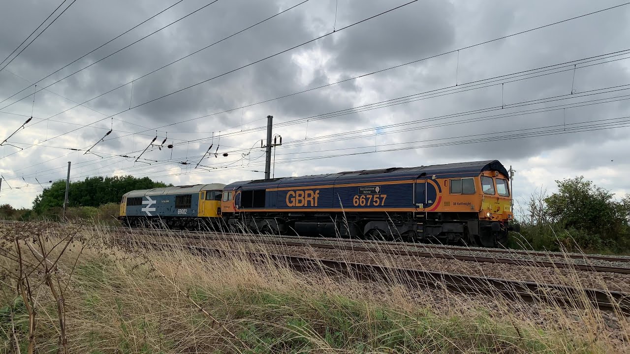 GBRf class 69, 69002 (retro BR blue livery) light engine with 66757 ...