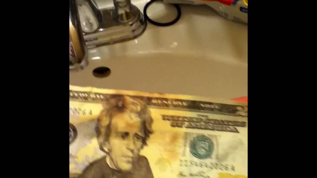 How to light money on fire without destroying it - YouTube