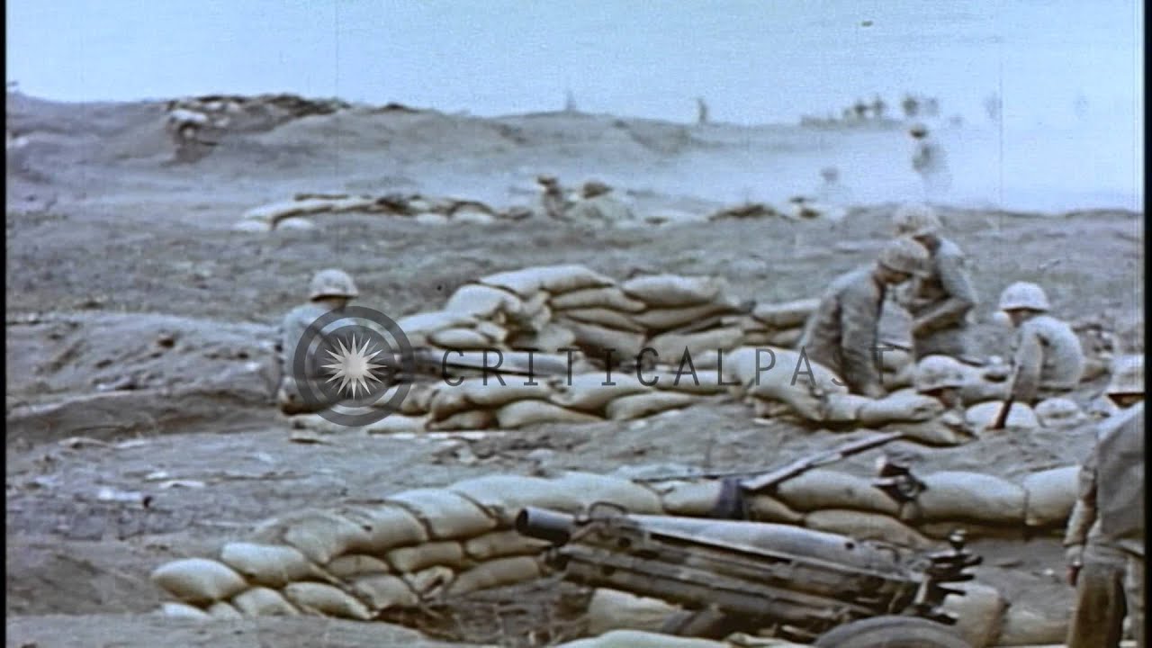 Field Howitzer being fired at Japanese position in Iwo Jima, Japan ...