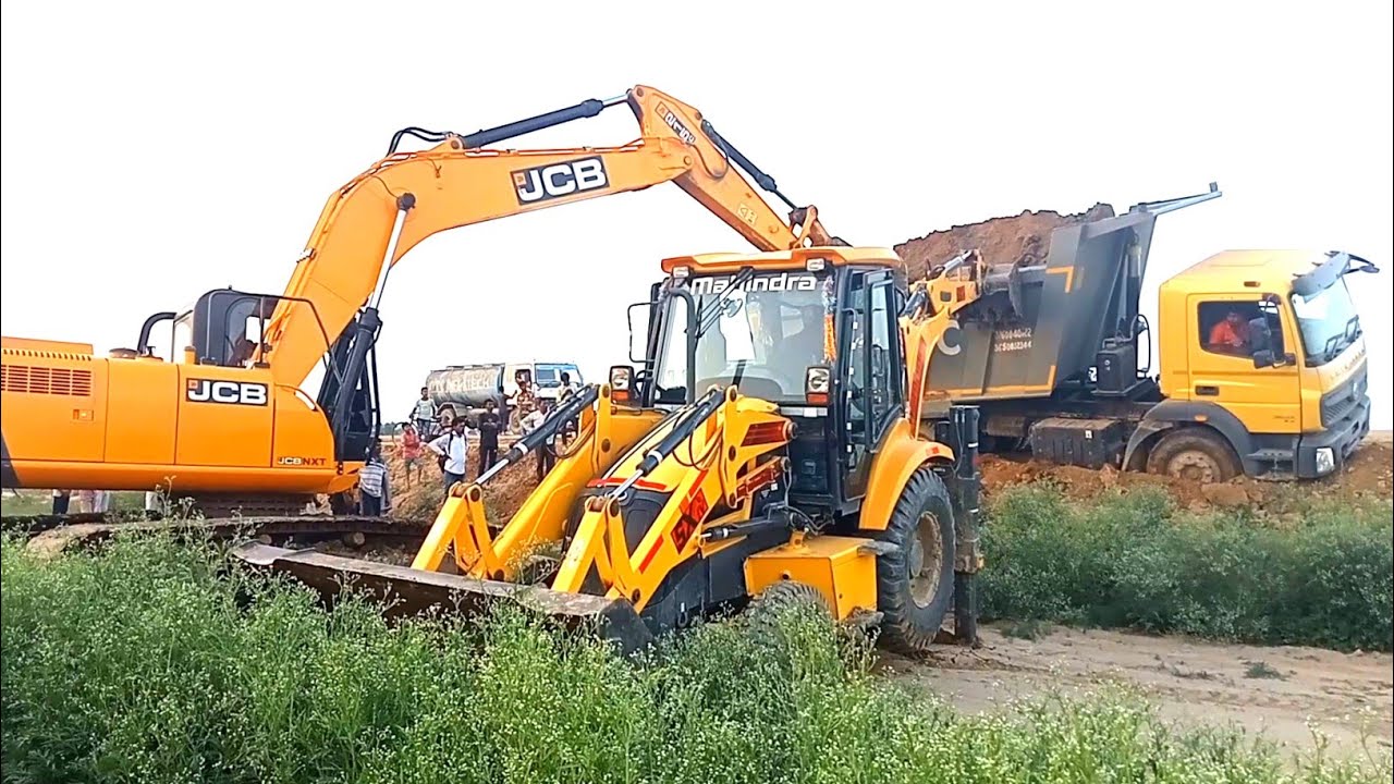 jcb 3DX Plus working loader in Tata truck Highway loading and poplin ...