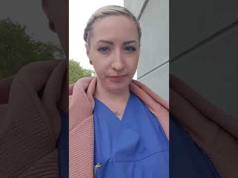 Blonde nurse smoking after work
