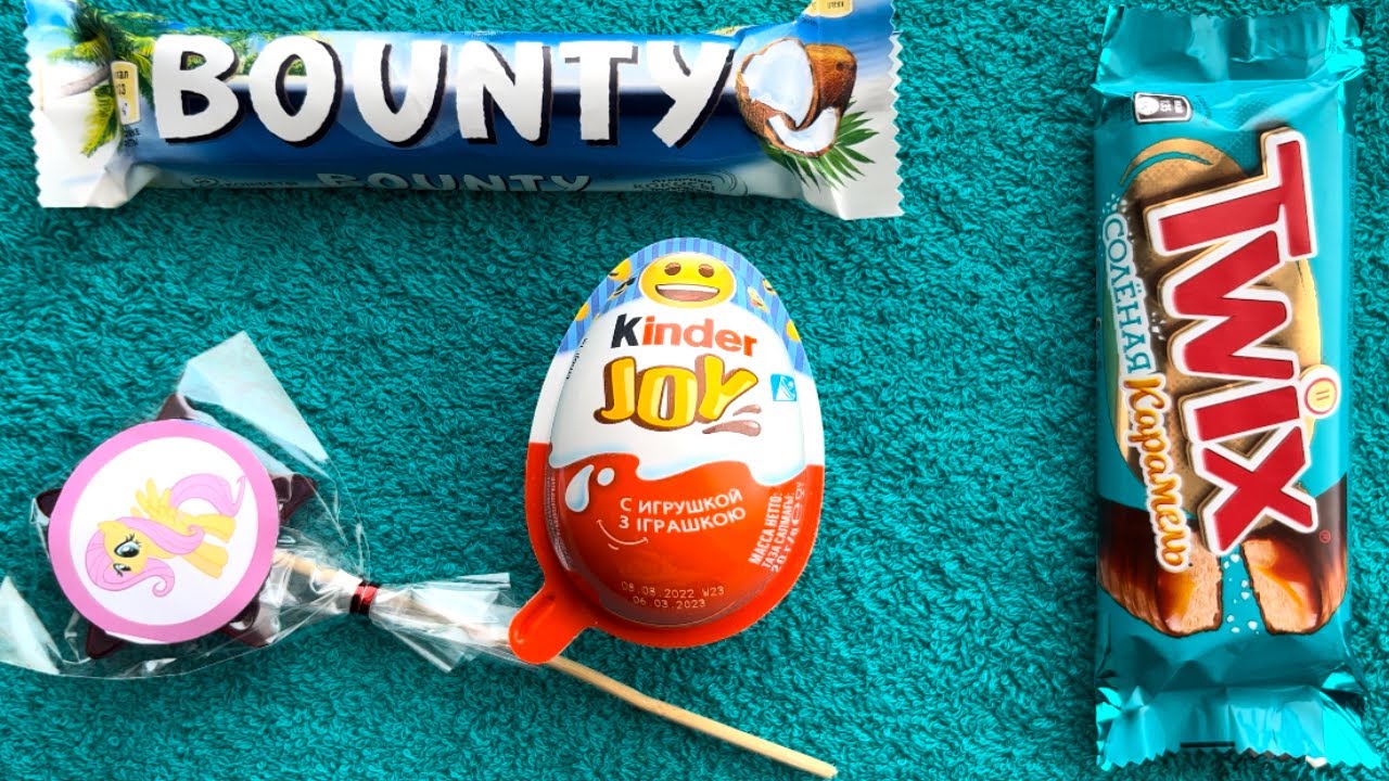 Lollipops and Sweets. ASMR. Kinder Joy. Bounty. Twix. Chocolate. - YouTube