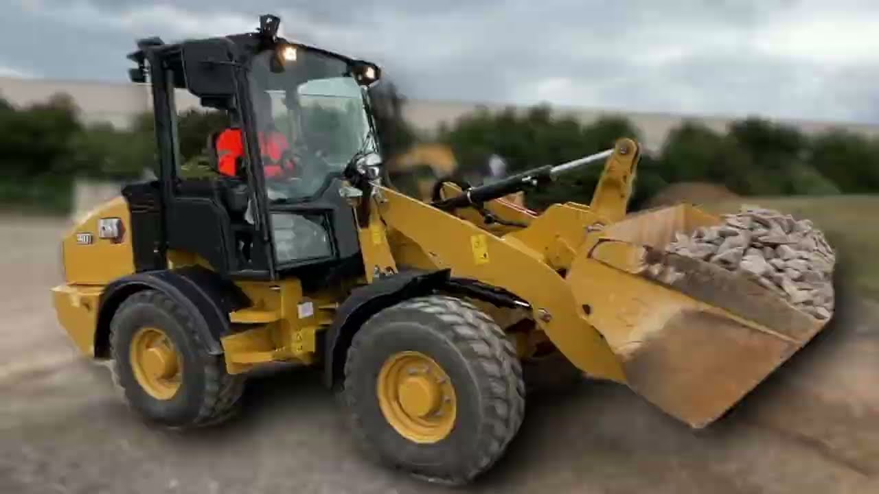 New Cat Compact Wheel Loader range with 14yr old Lucas and Caterpillar ...