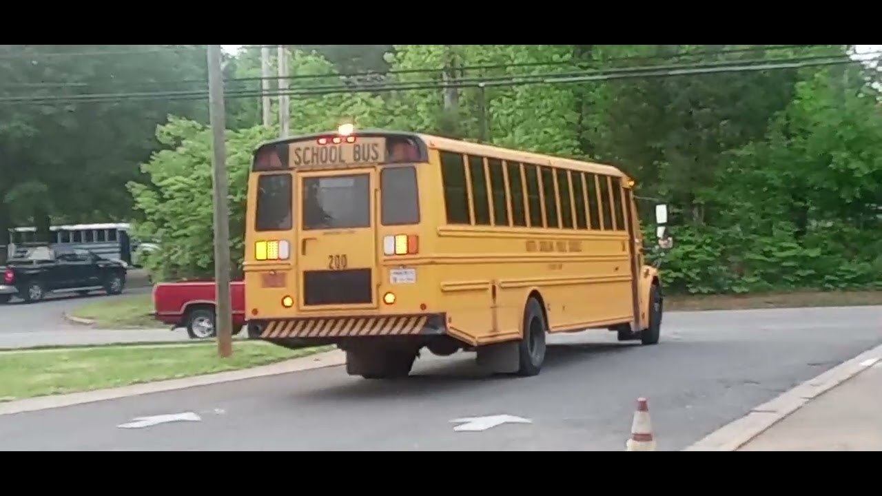 Bus 200 rolling out of the school - YouTube