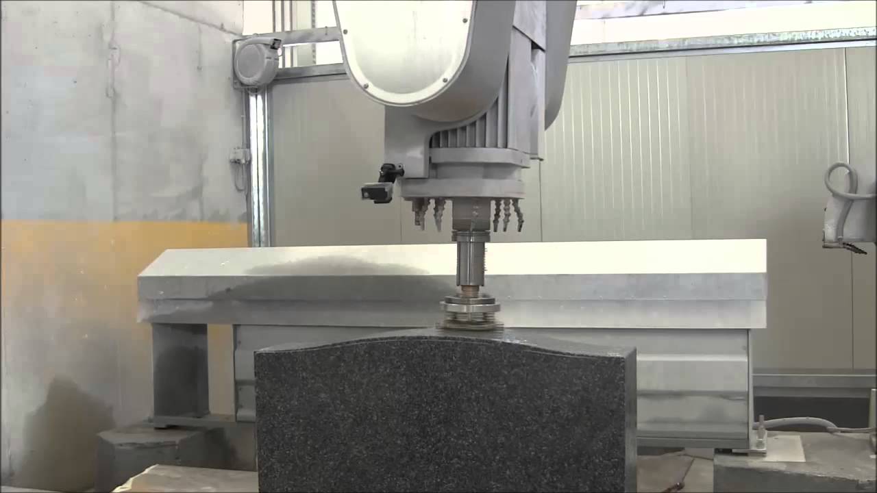 Shaping and polishing granite tomb - YouTube