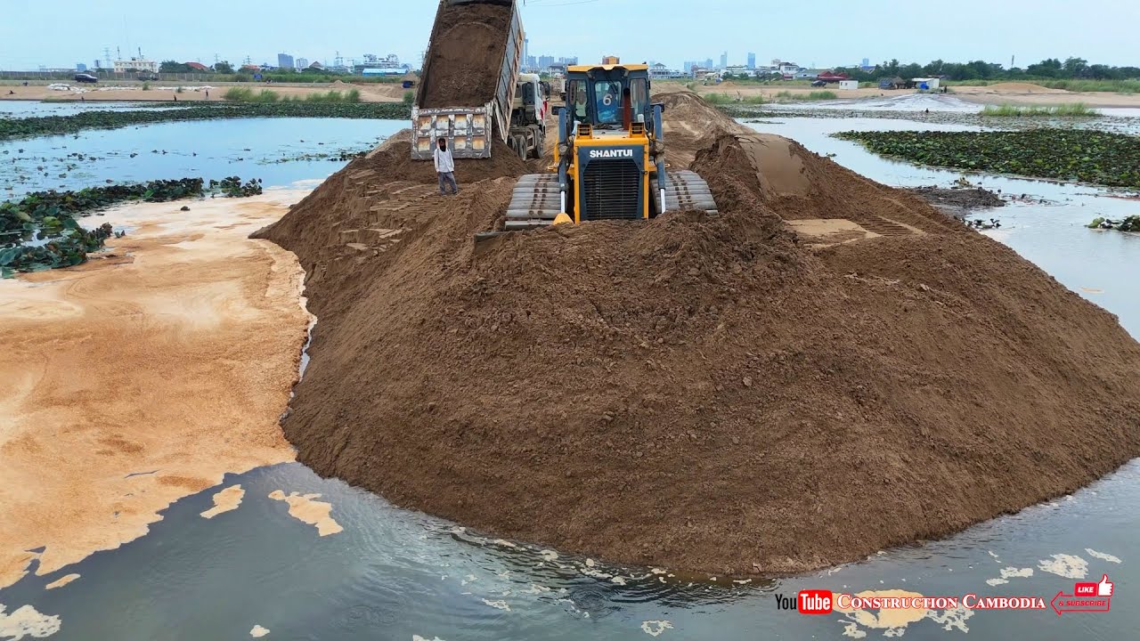 Sand filling process, Shantui Dozer Push Sand Into Water & Dongfeng ...