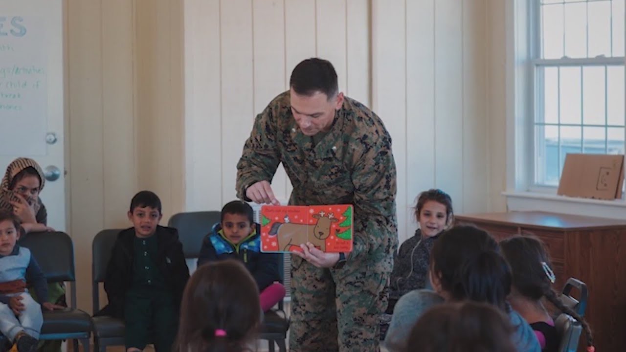 District Attorney John Kellner helps Afghan refugees settle - YouTube