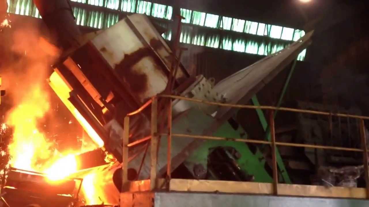 Forging Furnace pouring molten metal - YouTube