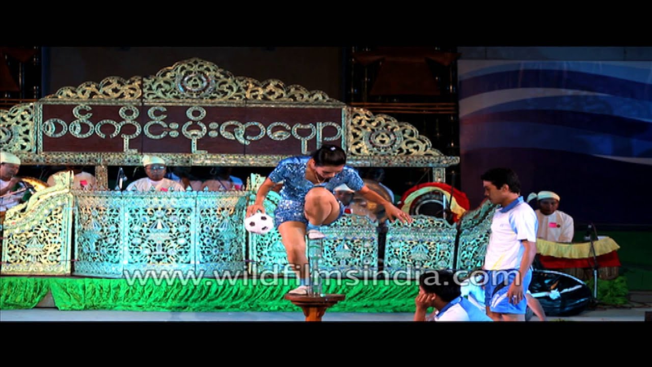 Juggling while balancing on a bottle - at Sangai festival - YouTube