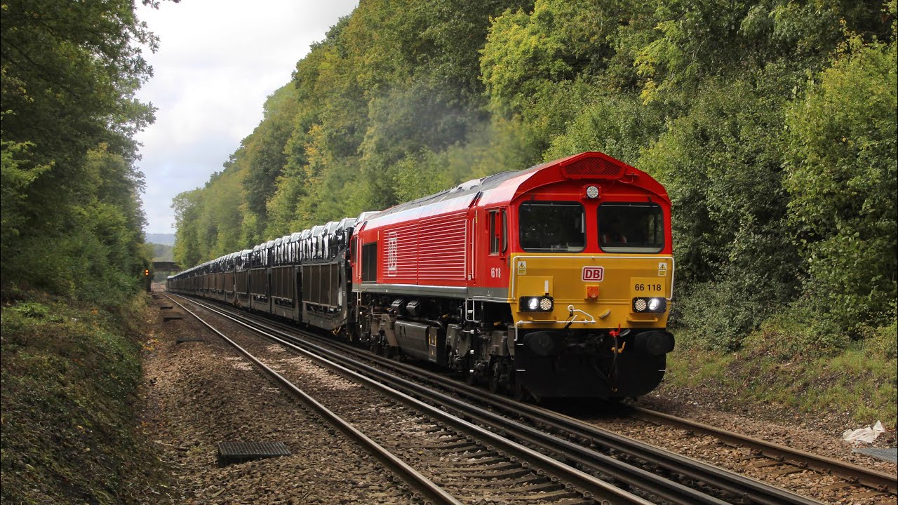 Recently repainted 66118 hauls Toyota cars for export through Kemsing ...