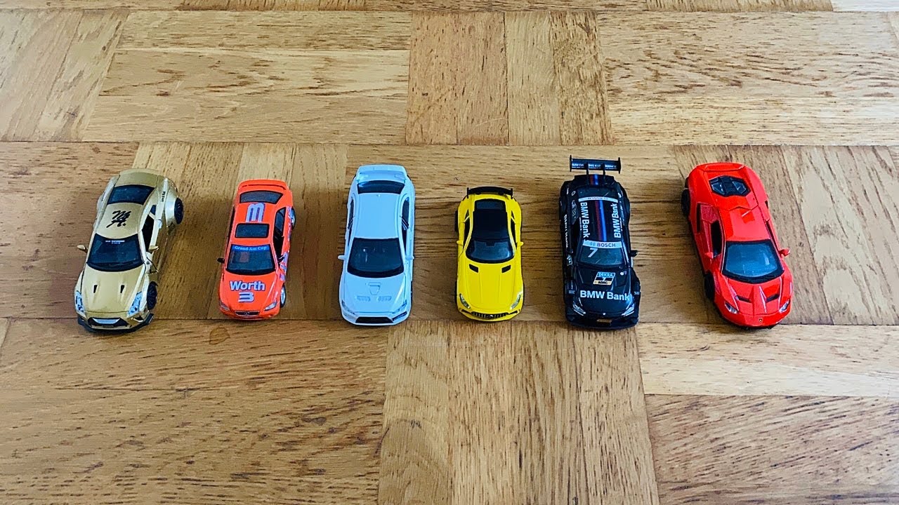 Sport Cars Of Various models On the Floor Being Shown in Dynamic ...