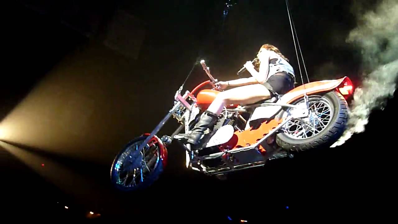 Miley Cyrus on Motorcycle - YouTube
