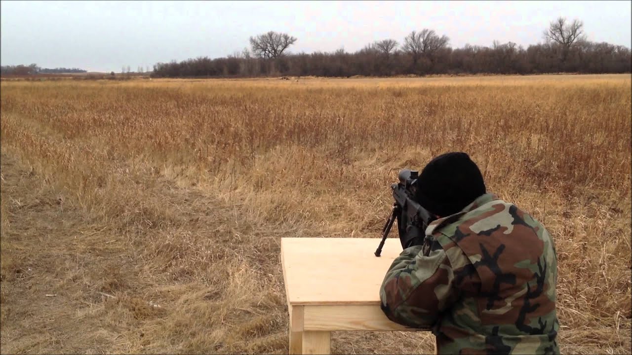 AK-47 and Bushmaster ACR shooting steel targets - YouTube