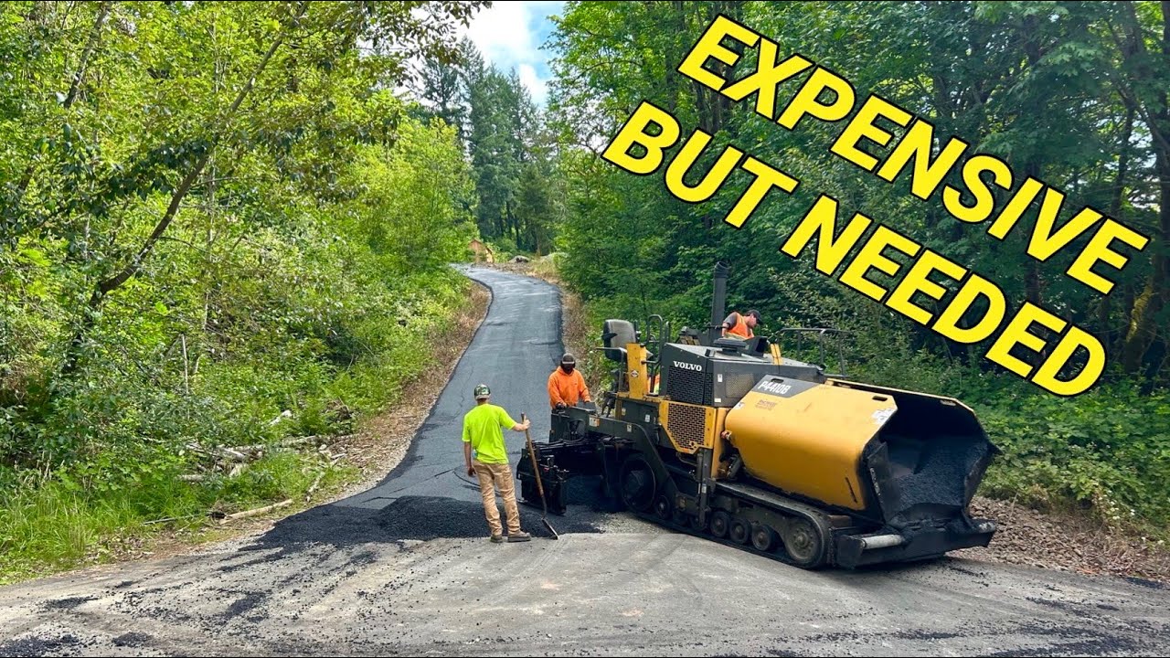 Paving asphalt up a steep hill to improve access to the campground ...