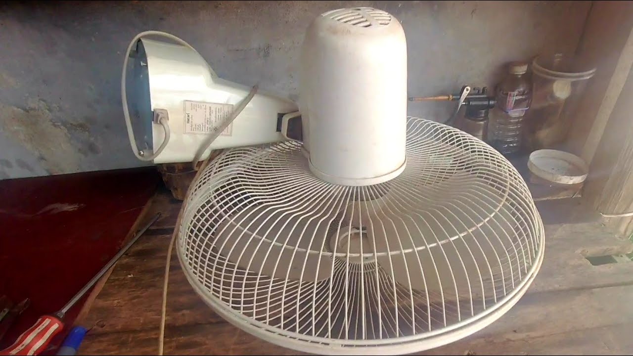 How to fix a wall mounted fan របៀបជួសជុលកង្ហារហាតារីជាប់ជញ្ជាំង - YouTube