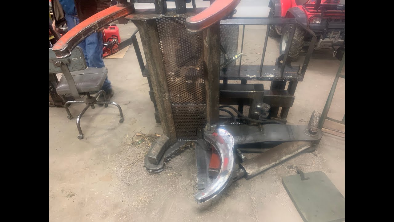 Tractor tree shear - YouTube