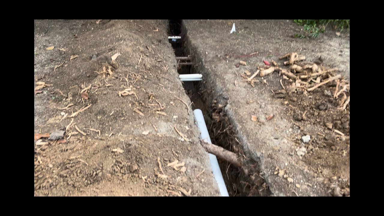 Why You Always Want to Hand Dig a Landscape Drainage Install - YouTube