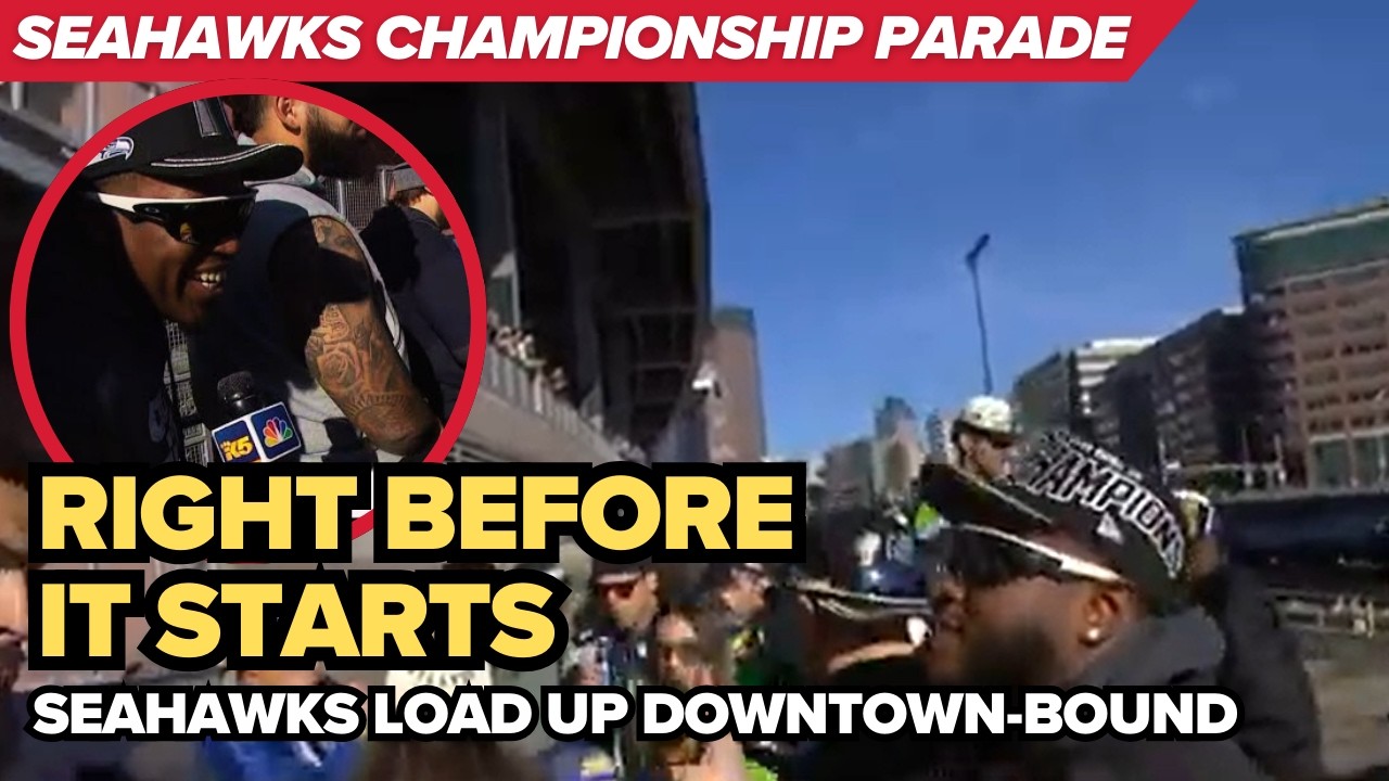 Behind the scenes: Seahawks players pack the bus line before the parade ...