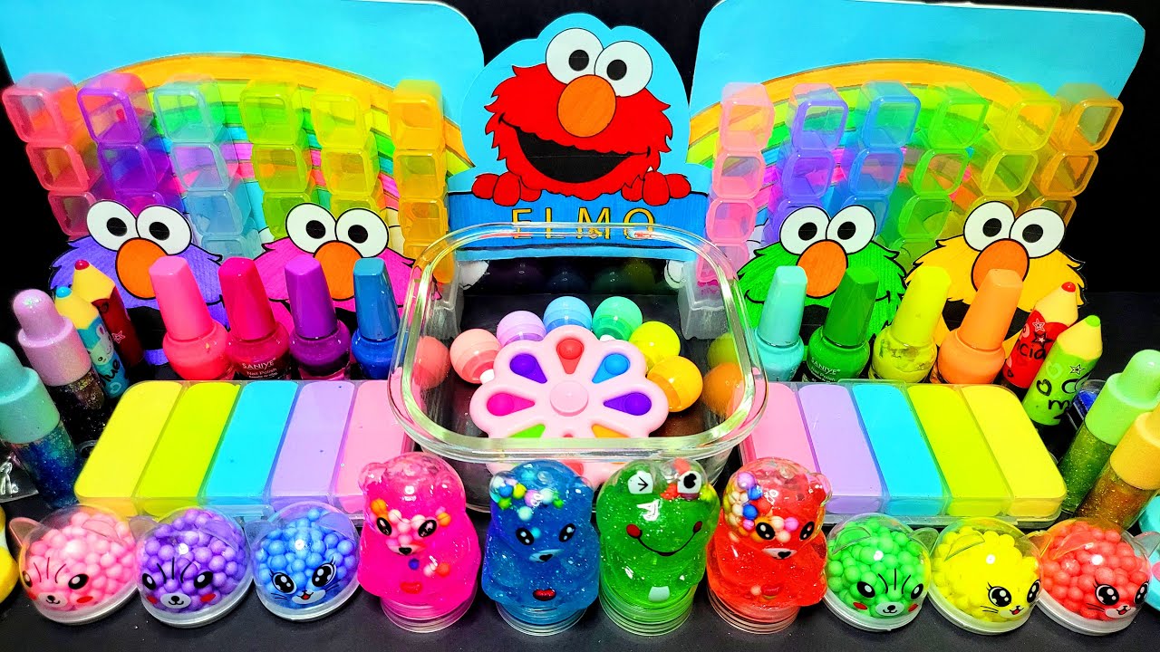 Elmo Slime - Muppets mixing makeup, glitter and much more into slime # ...