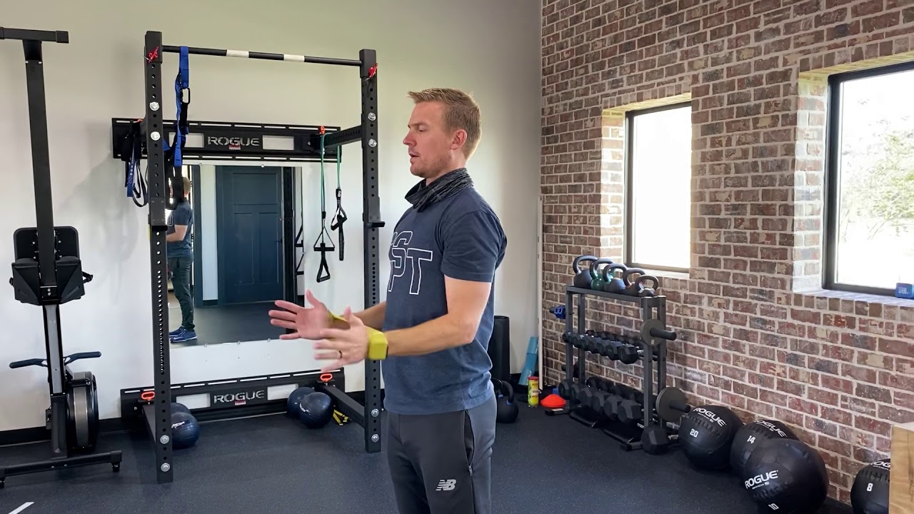 Isometric shoulder external rotation with flexion using a miniband ...