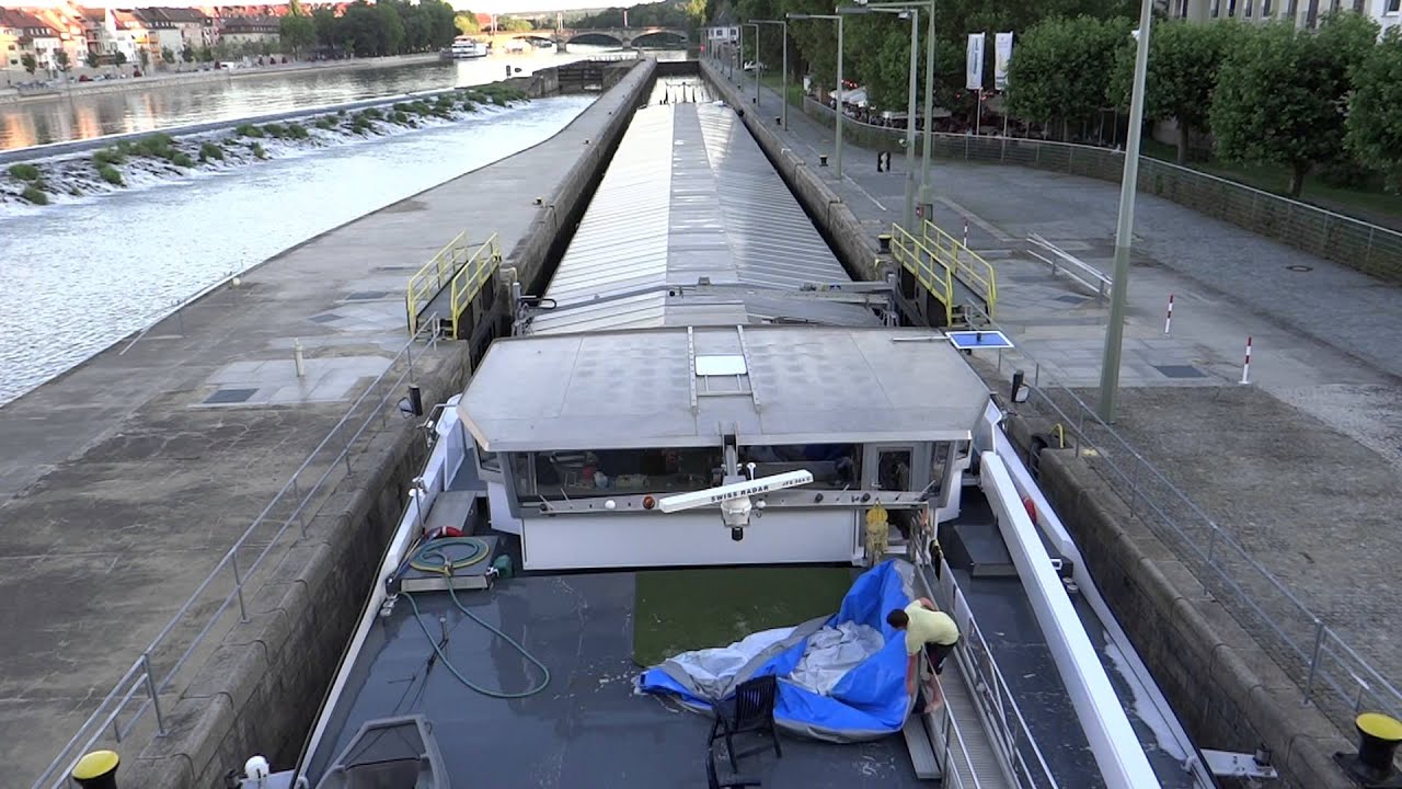 OurTour marvel at huge barge going into a lock in Würzburg, Germany ...